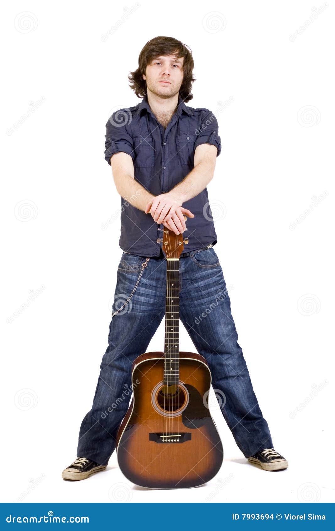 Man Holding His Acoustic Guitar between Legs Stock Photo - Image of ...