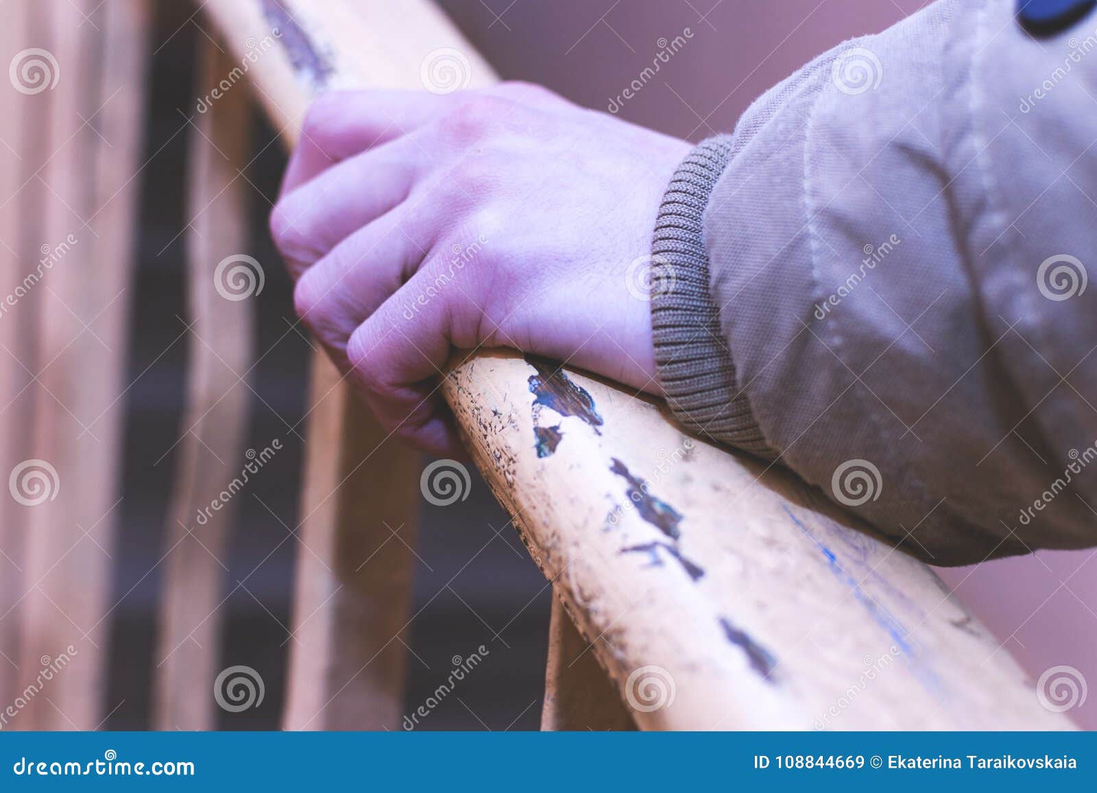 The Man Holding His Hand Over the Railing Stock Image - Image of gift ...