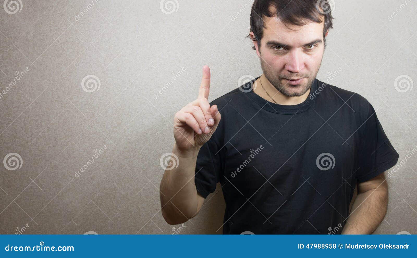 Man Holding His Index Finger Up by Stock Photo - Image of note ...