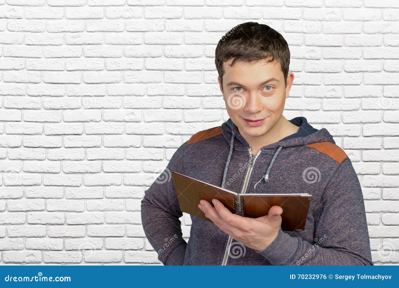 Man holding his notebook stock photo. Image of binder - 70232976