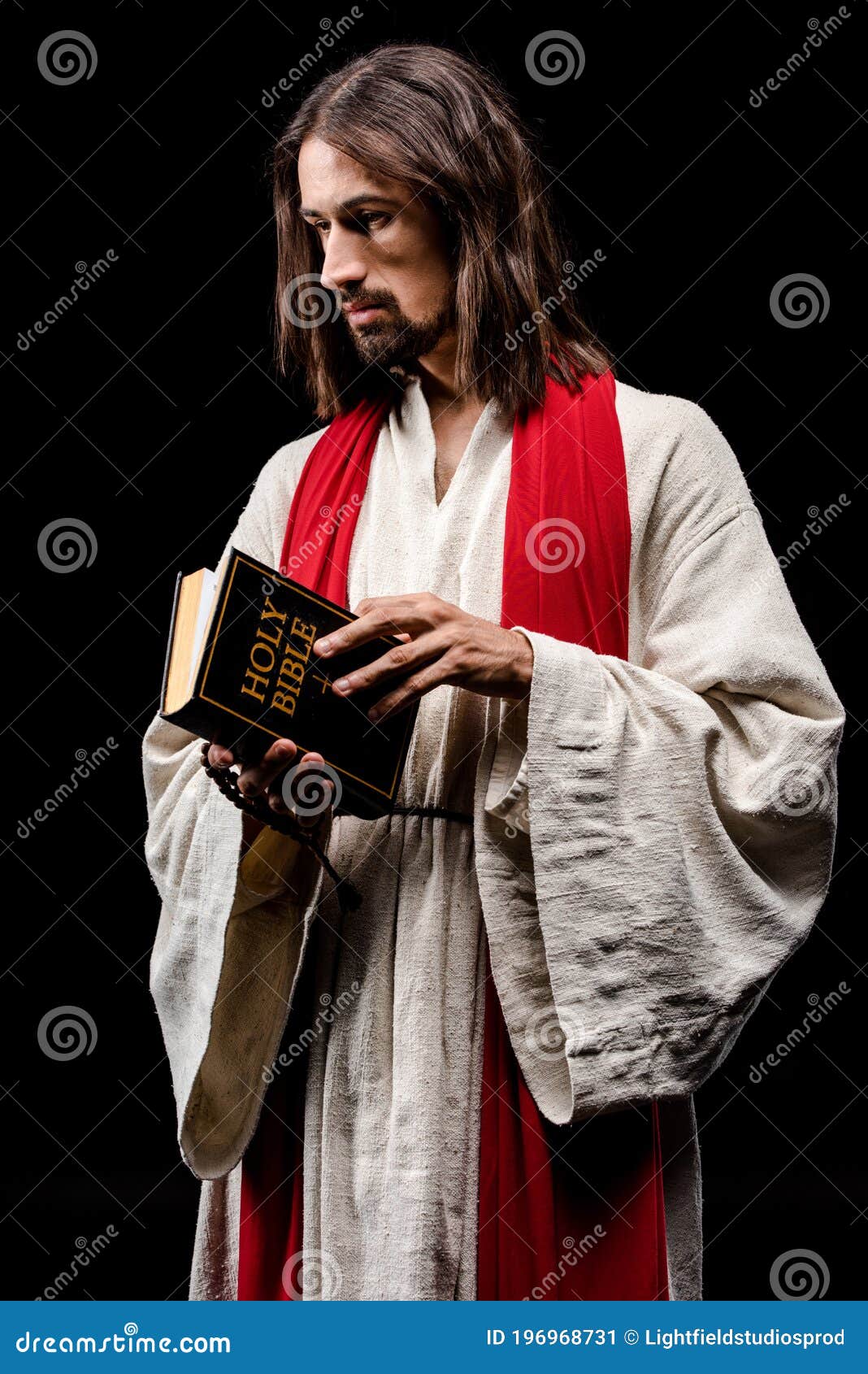 Man Holding Holy Bible Isolated on Black Stock Image - Image of believe ...