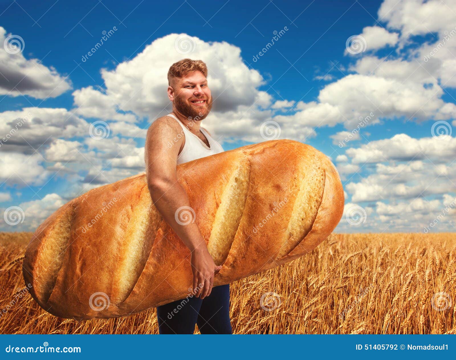 Man Holding a Huge Bread on Field of Wheat Stock Photo - Image of ...