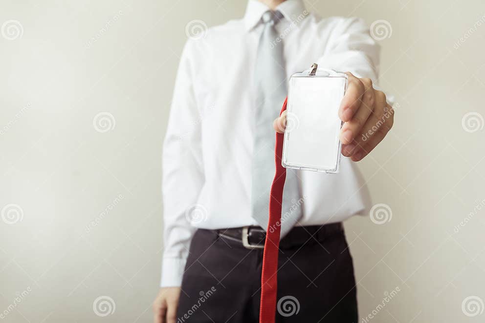 Man Holding Identification Card. Stock Photo - Image of laminated ...