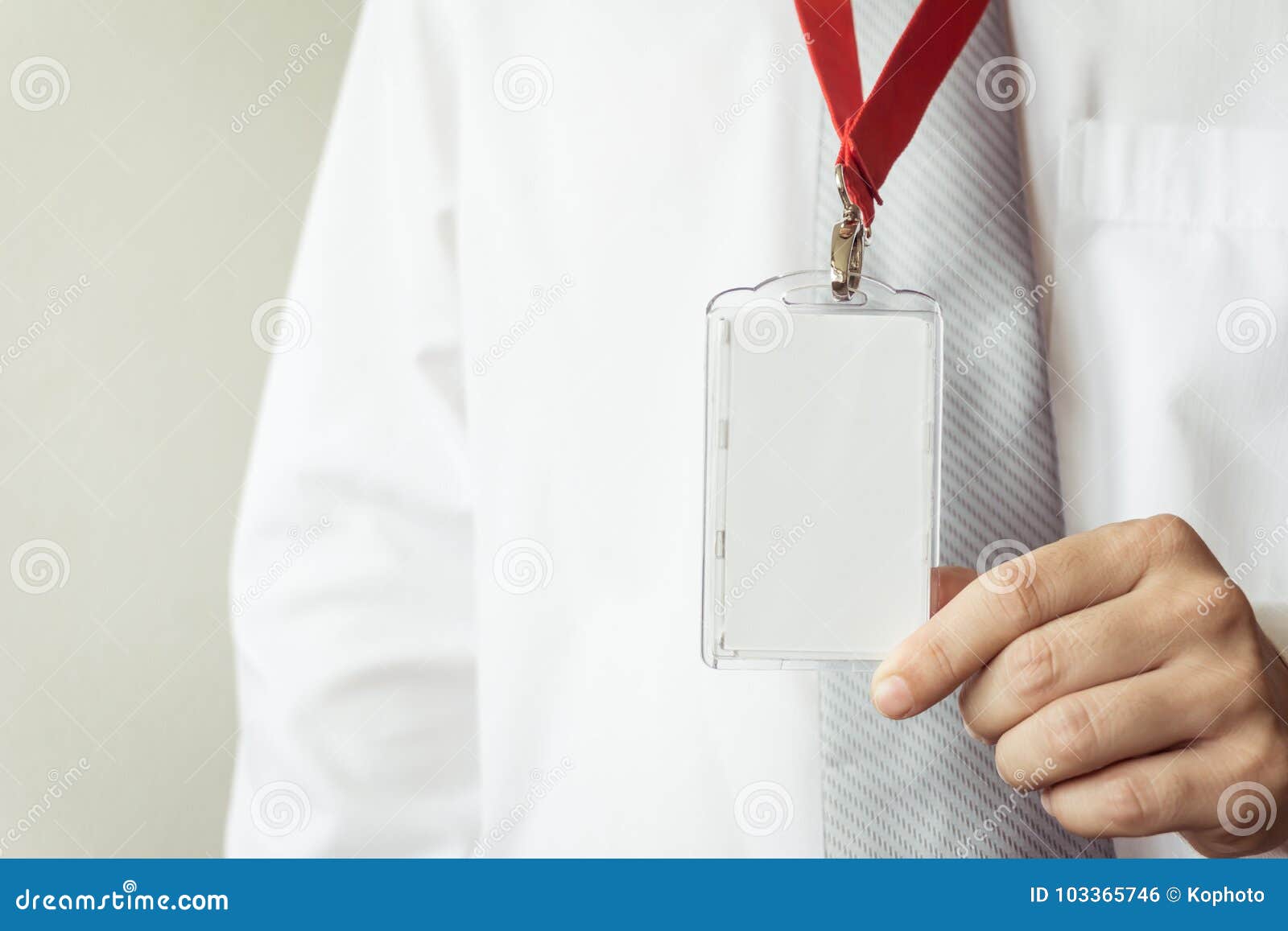 Man Holding Identification Card. Stock Photo - Image of clasp, design ...
