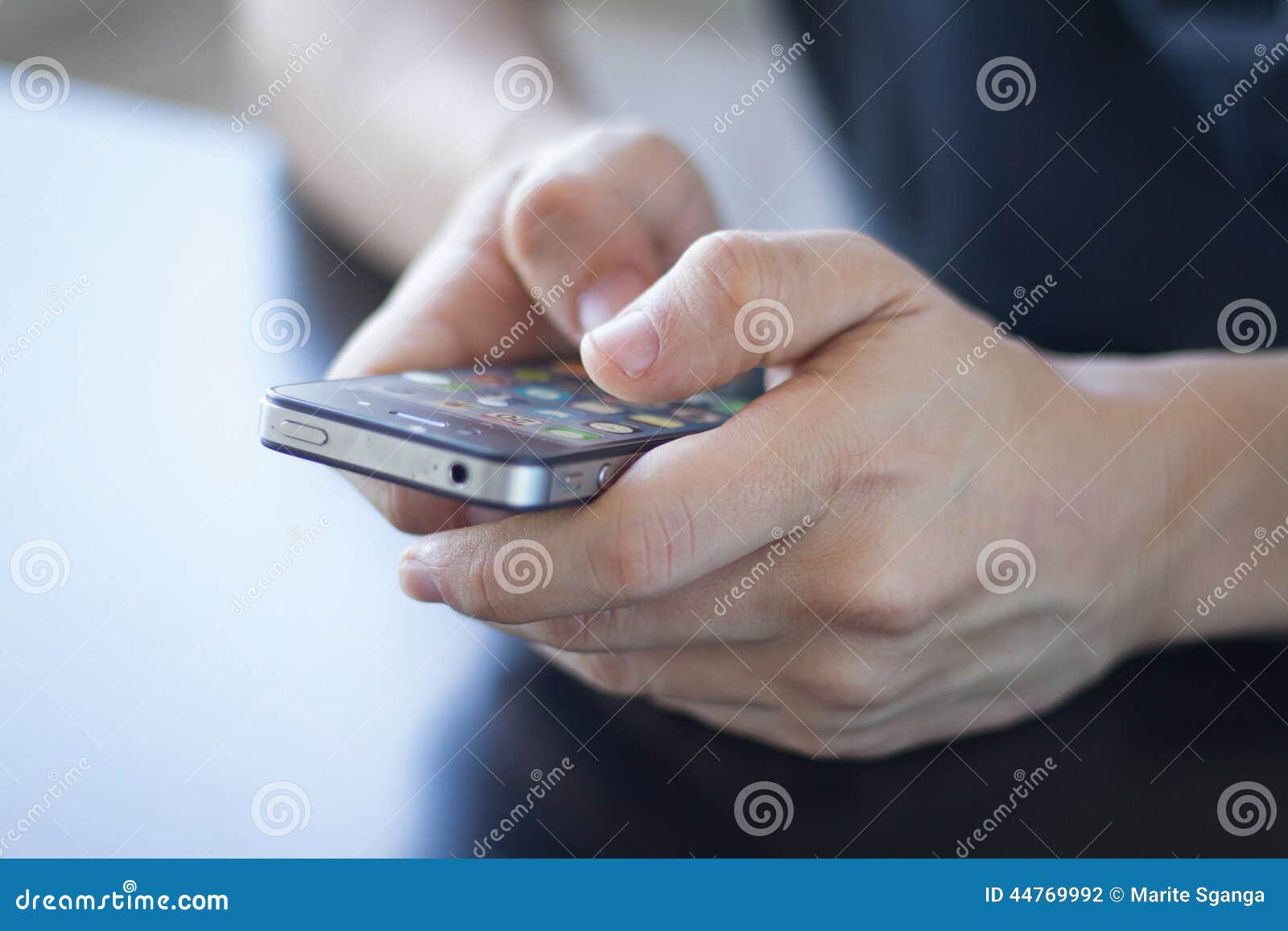 Man Holding an Iphone in Hands Editorial Photography - Image of ...