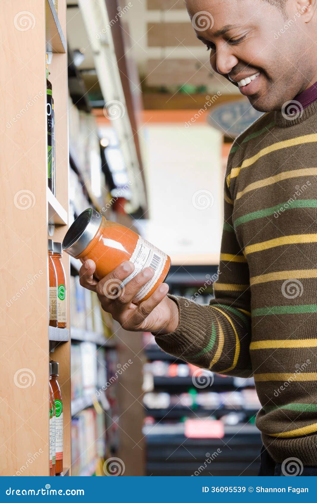 A man holding a jar stock image. Image of blur, blurring - 36095539