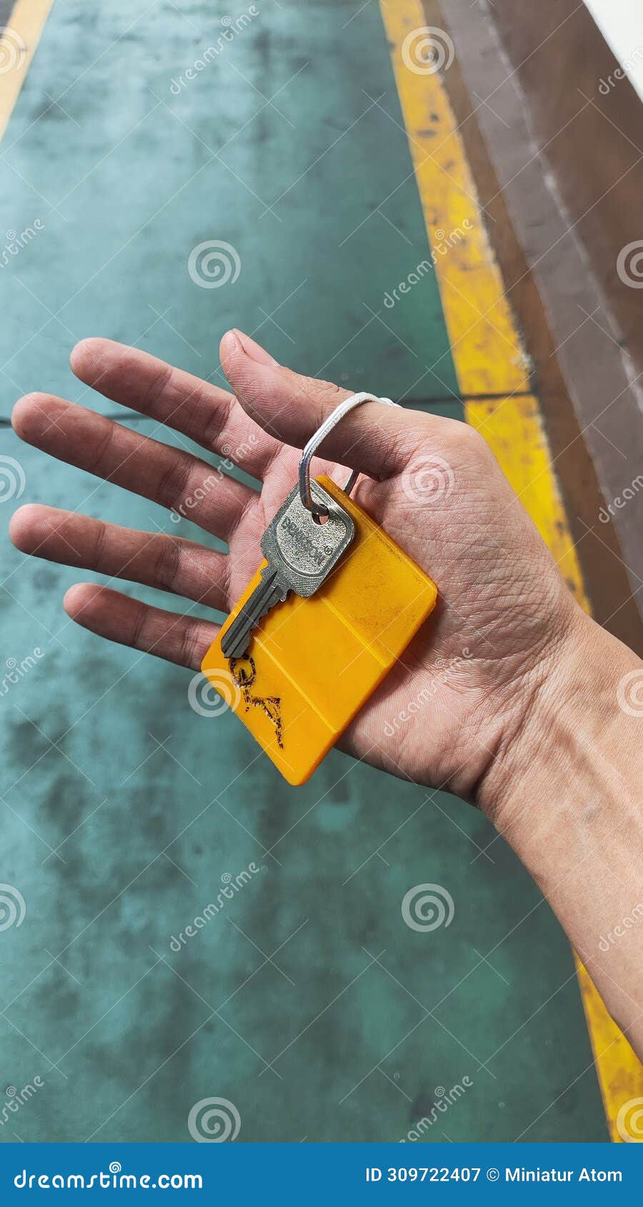 Man Holding a Key with His Finger Editorial Photography - Image of ...