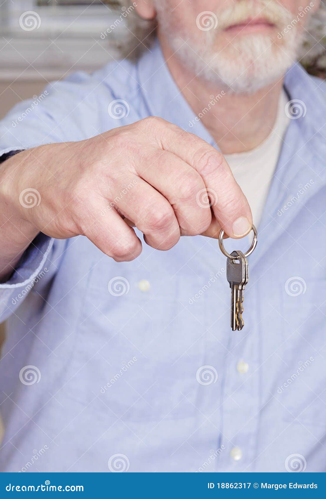 Man holding keys stock image. Image of hand, denim, presenting - 18862317