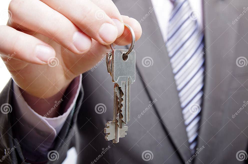 Man holding keys stock photo. Image of businessman, lock - 24300998