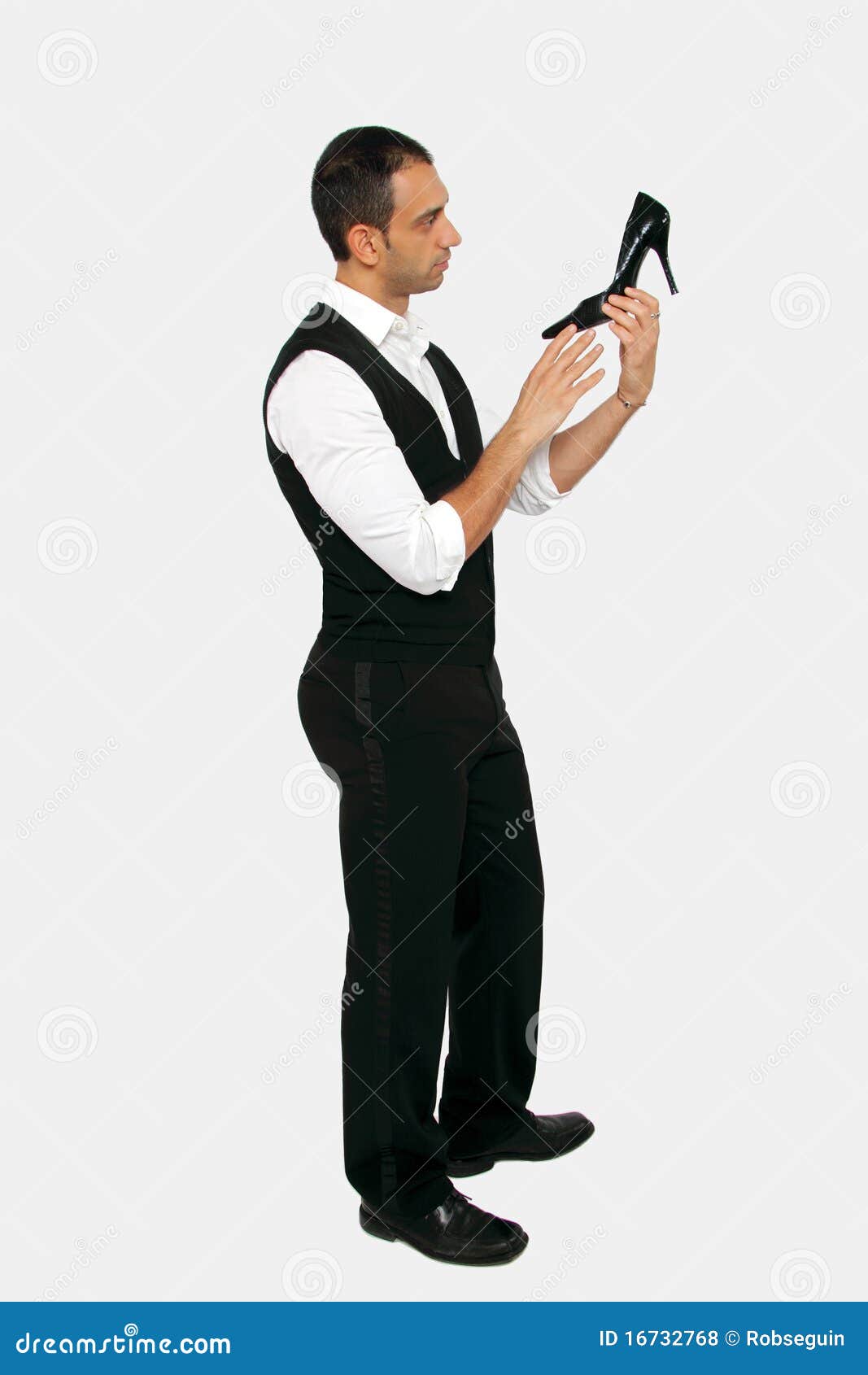 Man holding ladies shoe stock photo. Image of attractive - 16732768