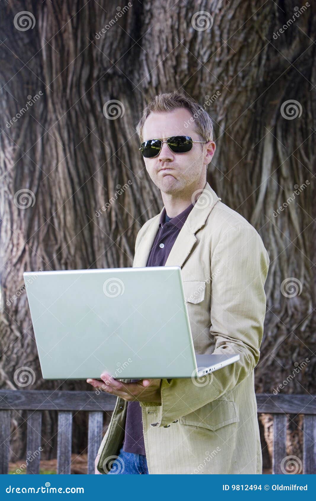 Man Holding Laptop Computer Stock Photo - Image of networking, outdoor ...