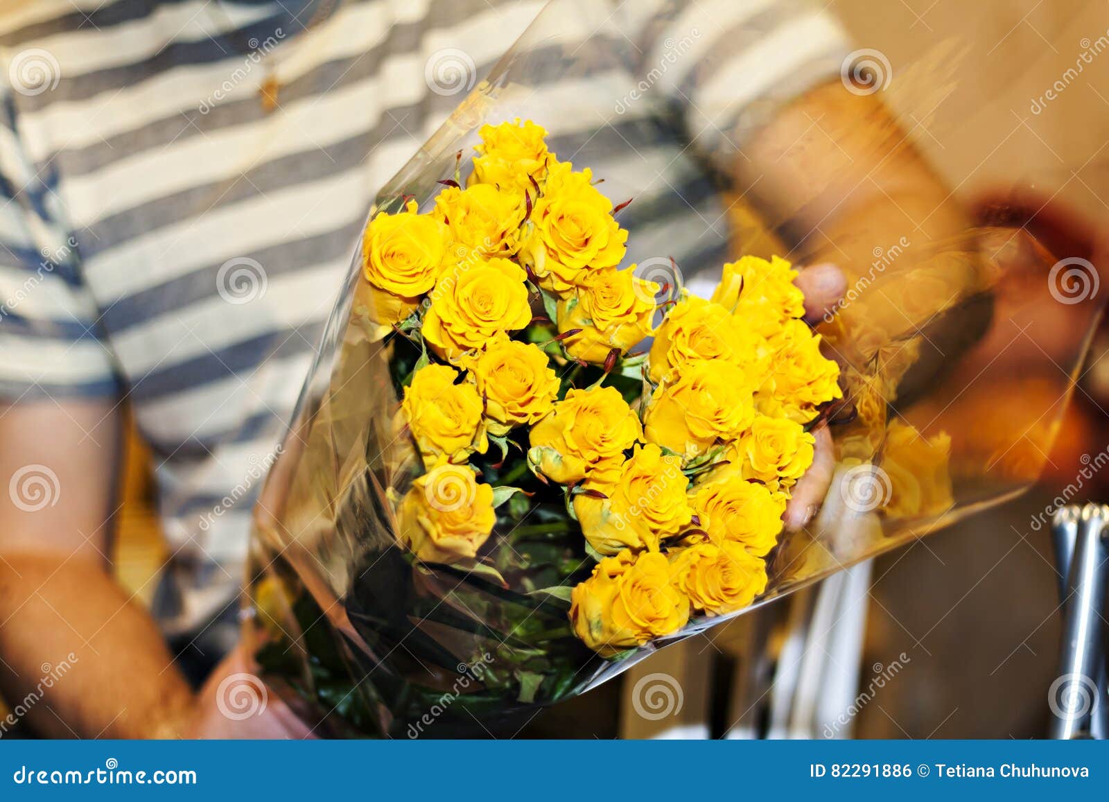 Man Holding a Large Bouquet of Yellow Roses Stock Photo - Image of gift ...