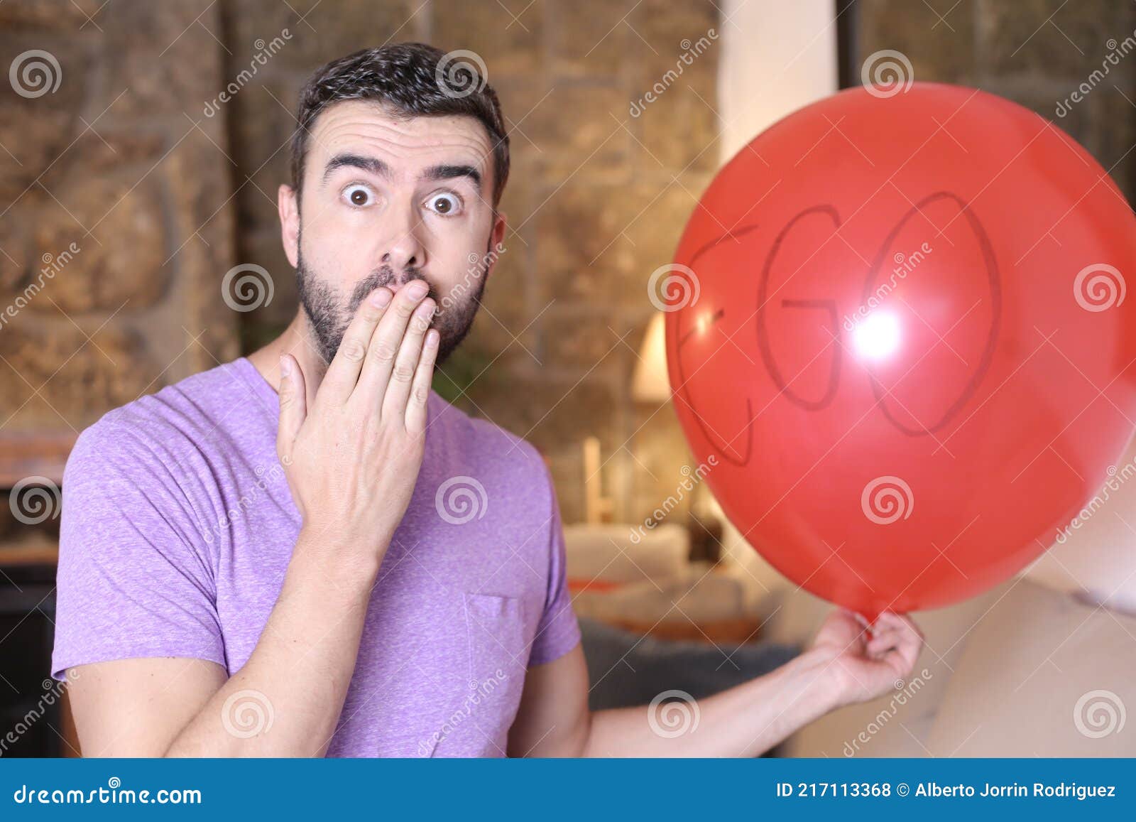 Man Holding Large Red Balloon Representing His Ego Stock Photo - Image ...