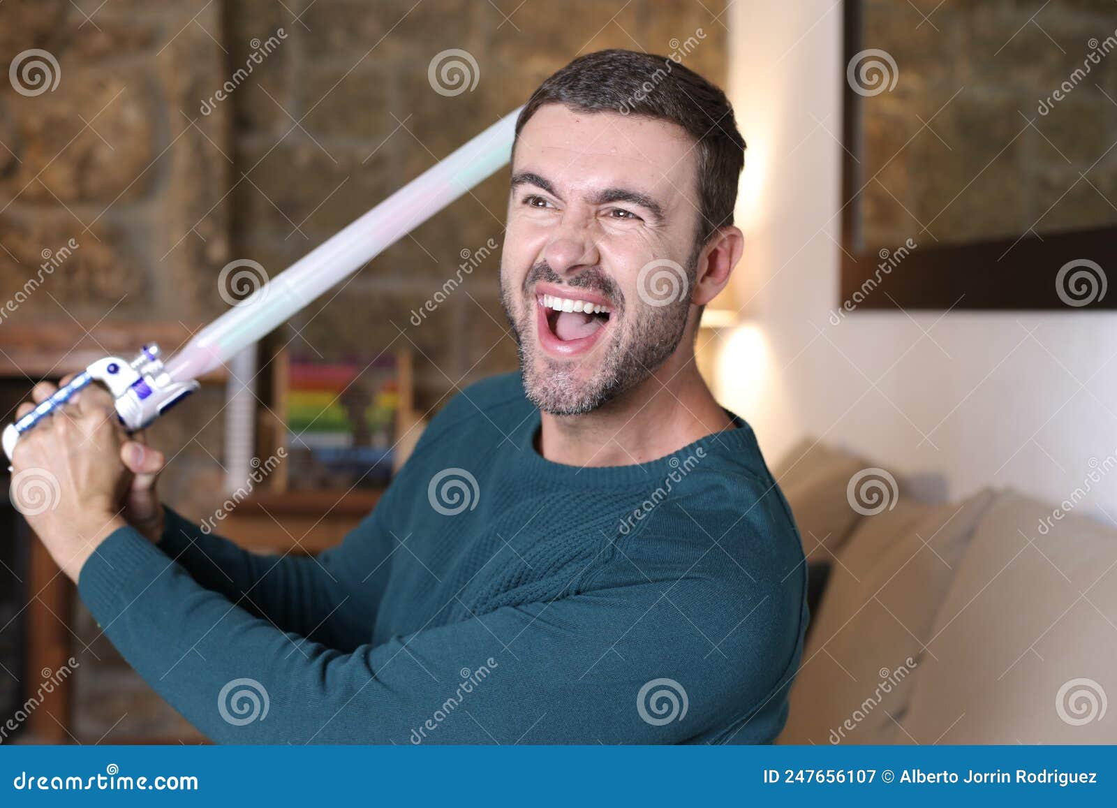 Man holding a laser sword stock image. Image of fantastic - 247656107