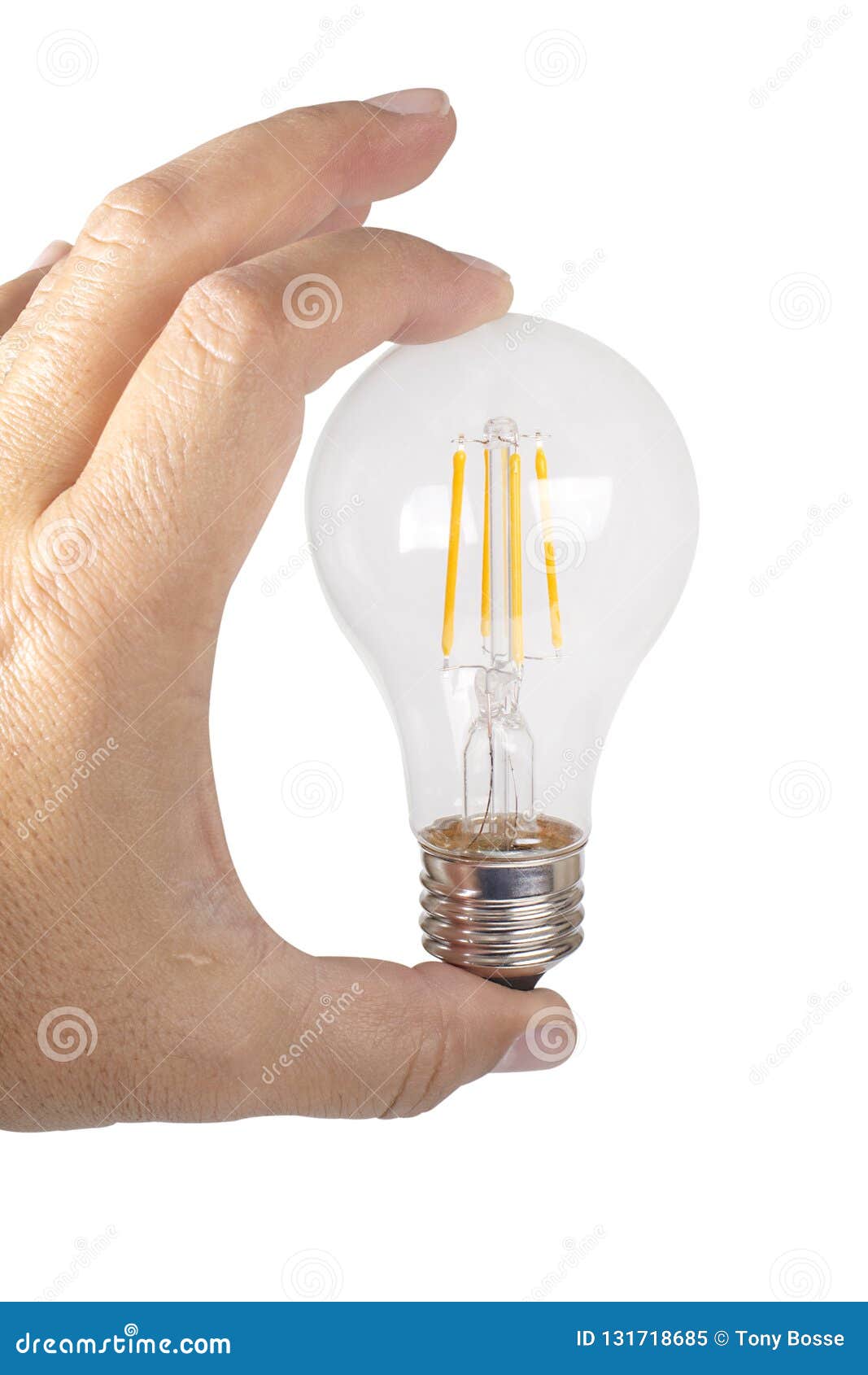 Man Holding an LED Light Bulb Stock Image - Image of isolated, hand ...