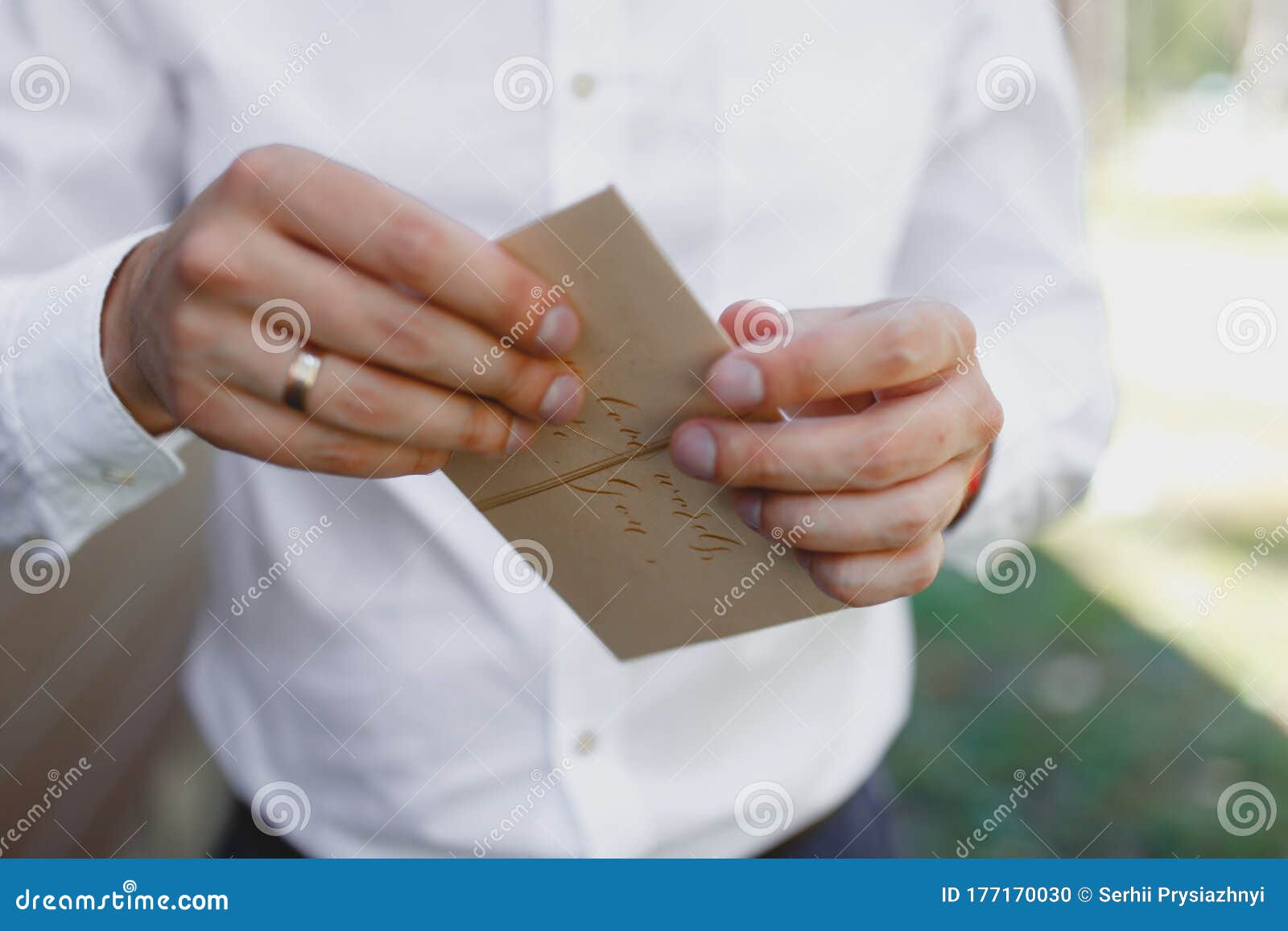 Man Holding a Letter in His Hands. Stock Photo - Image of background ...