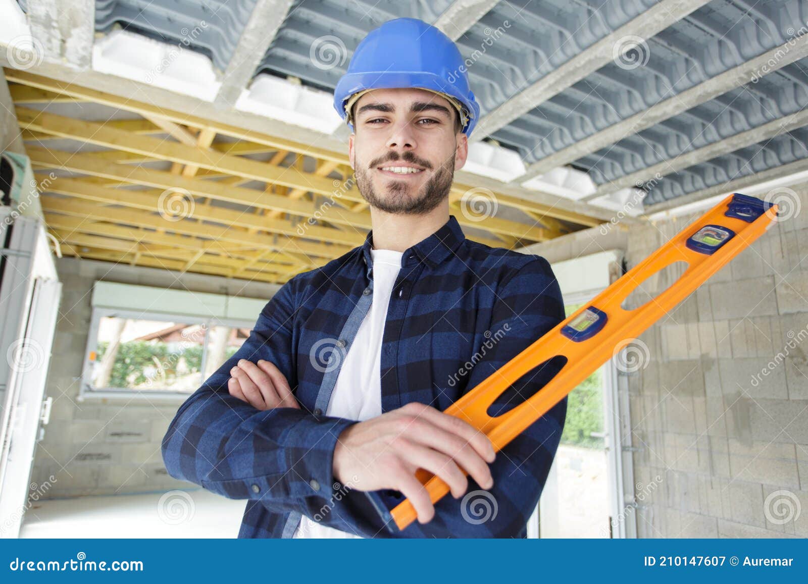 Man holding level stock image. Image of construction - 210147607