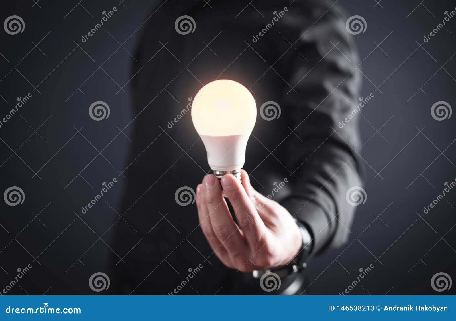 Man Holding Light Bulb. Inspiration and Creativity Stock Image - Image ...