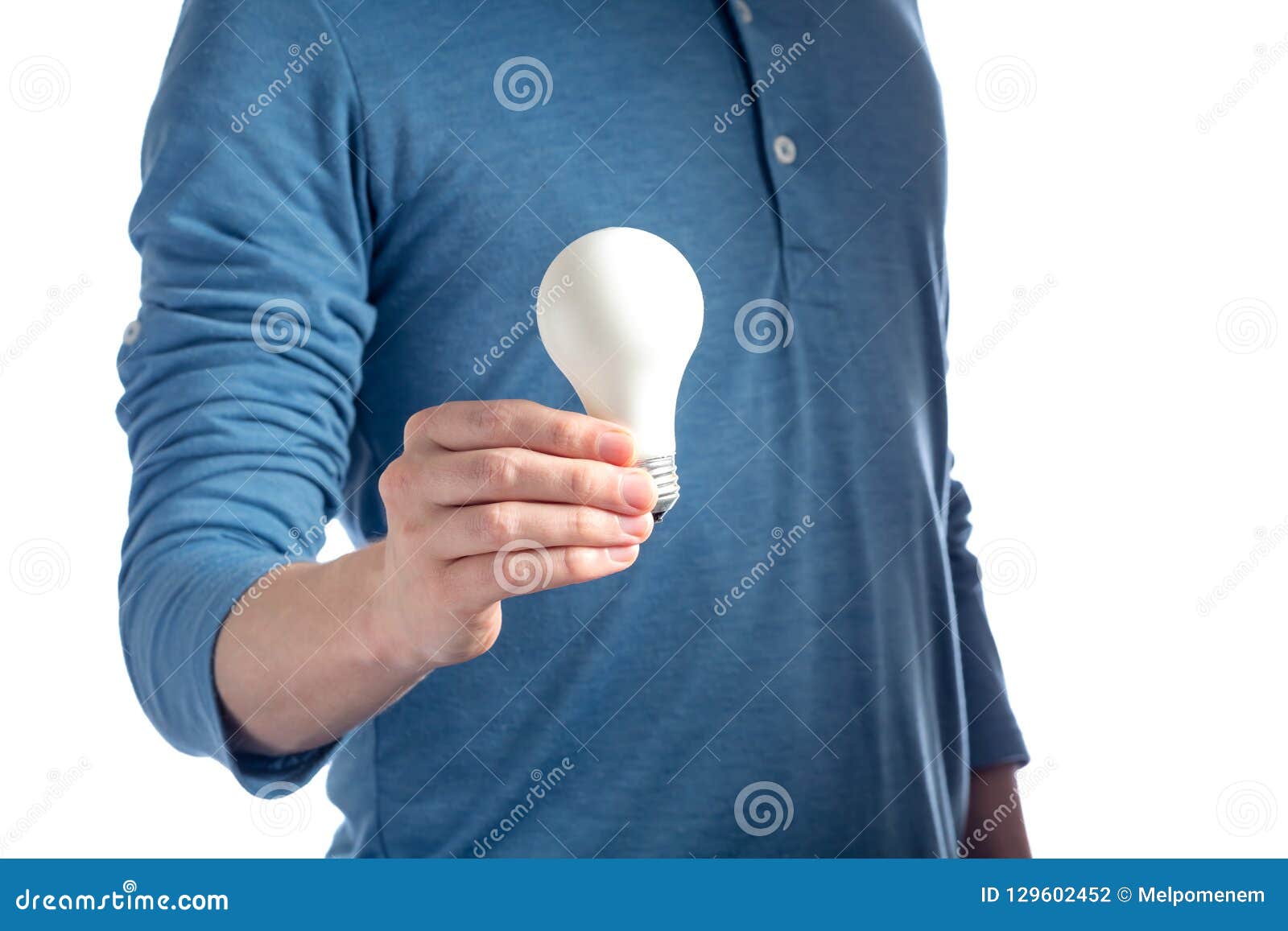 Man holding a light bulb stock photo. Image of solution - 129602452