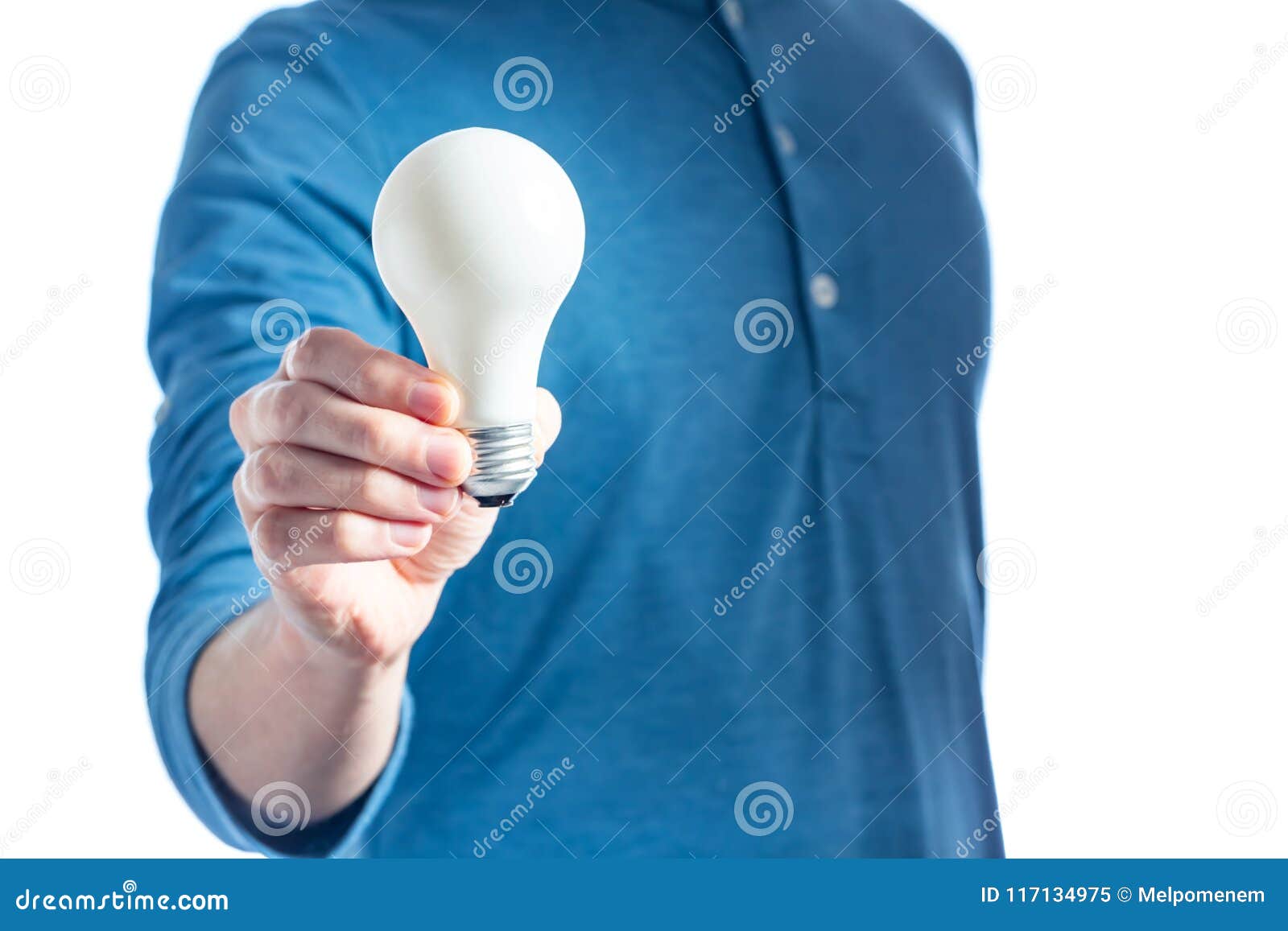 Man holding a light bulb stock image. Image of incandescent - 117134975