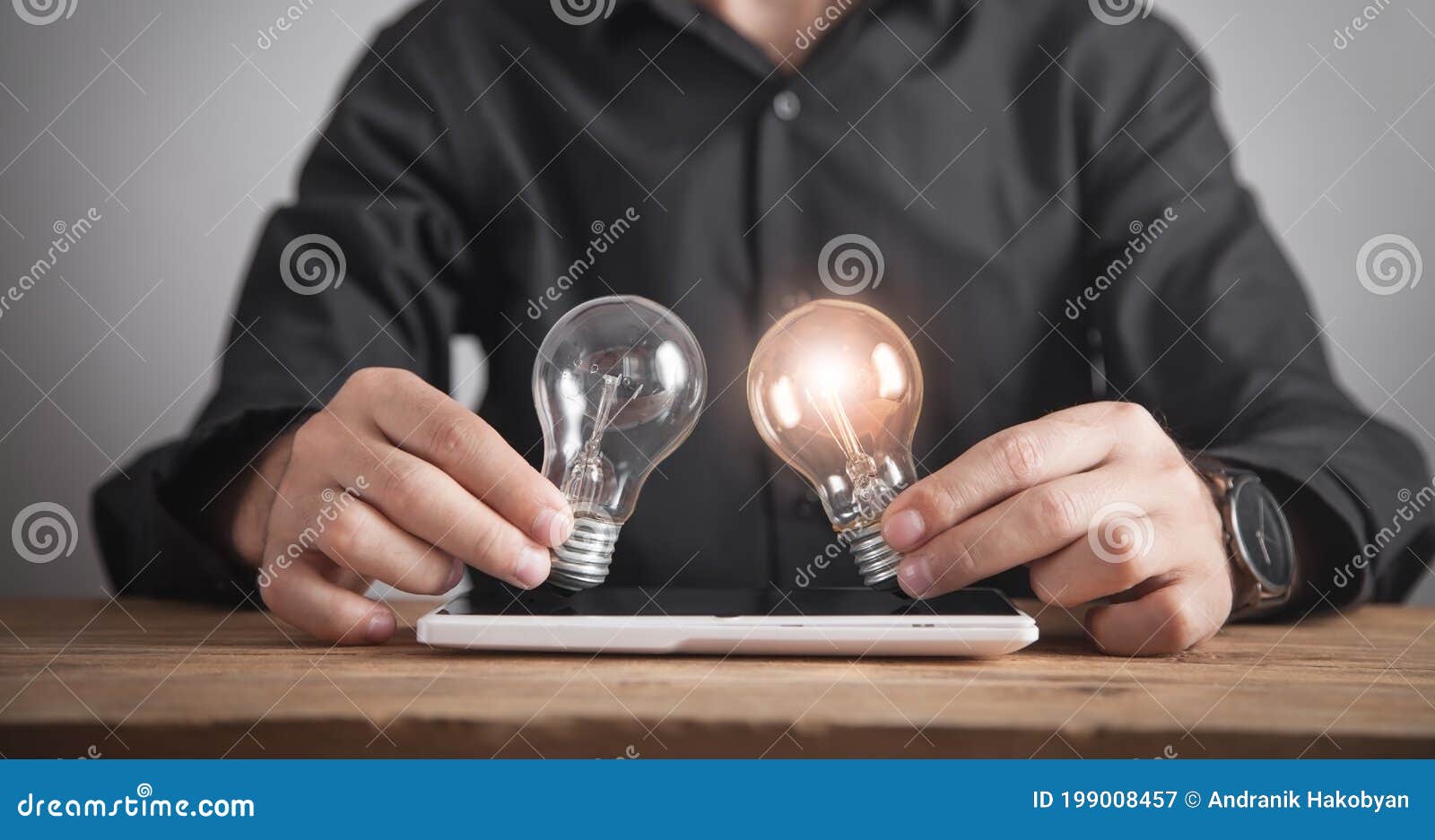 Man Holding Light Bulbs. Concept of Inspiration and Creativity Stock ...