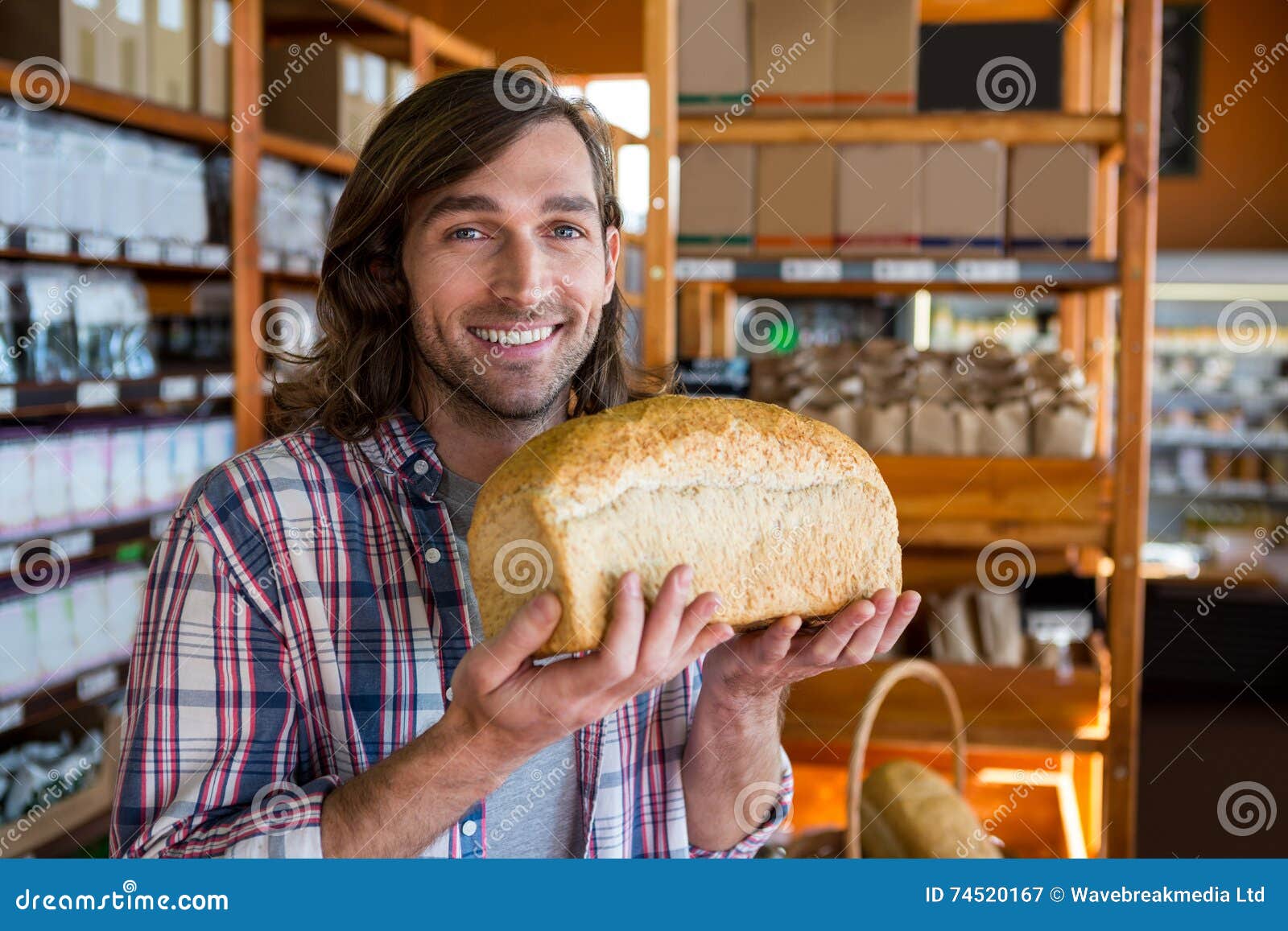 Man Holding a Loaf of Bread Stock Image - Image of freshness, loaf ...