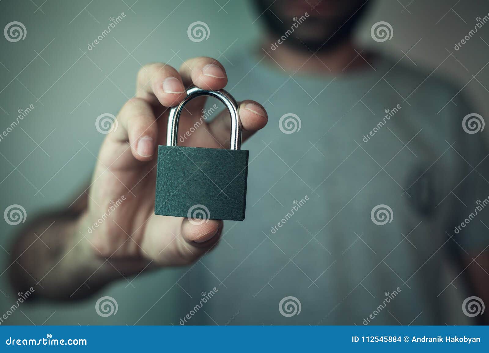 Man holding lock. stock photo. Image of sign, online - 112545884
