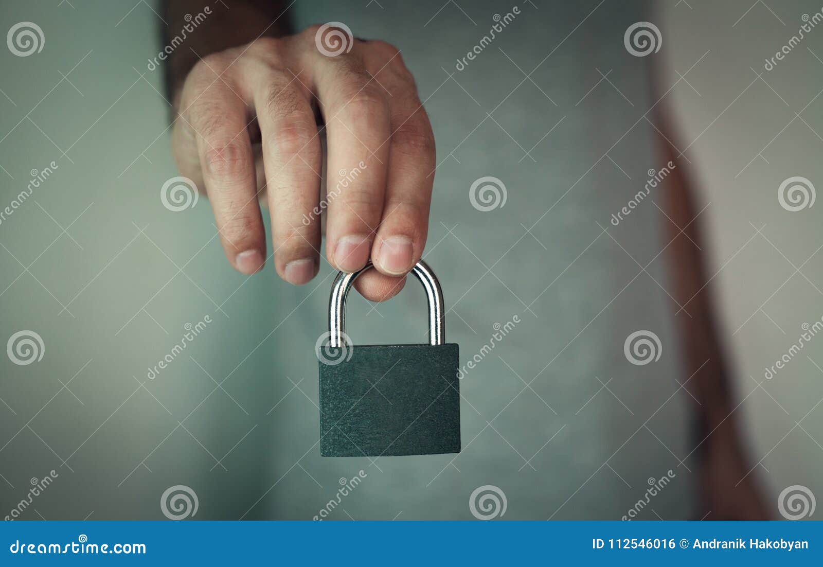 Man holding lock. stock photo. Image of sign, online - 112546016