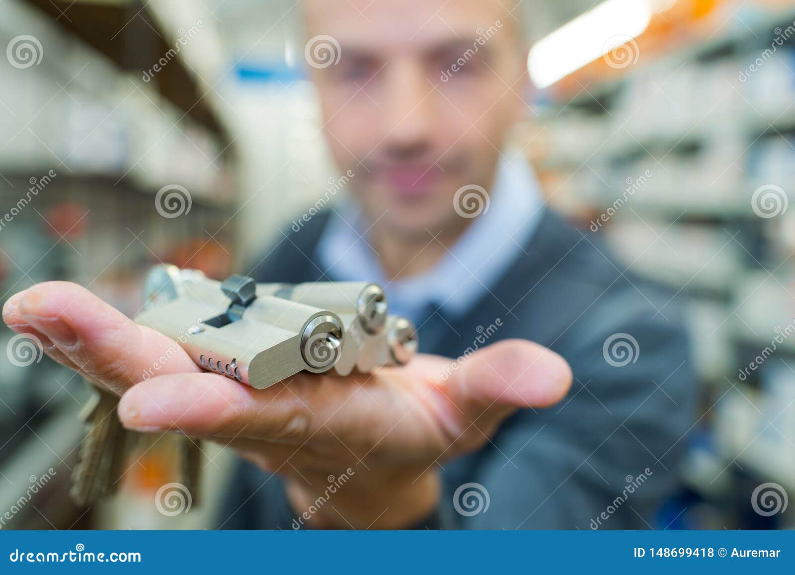 Man holding a locker stock photo. Image of lock, apartment - 148699418