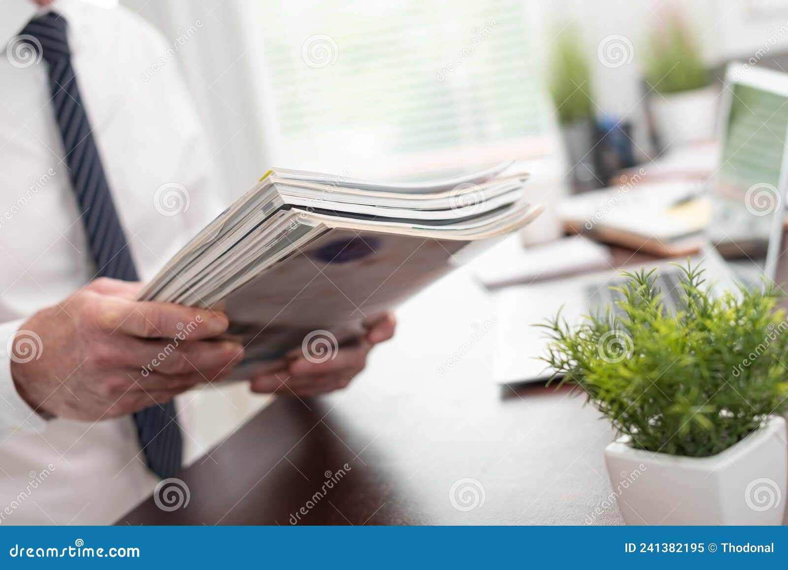 Man holding magazines stock image. Image of pile, information - 241382195