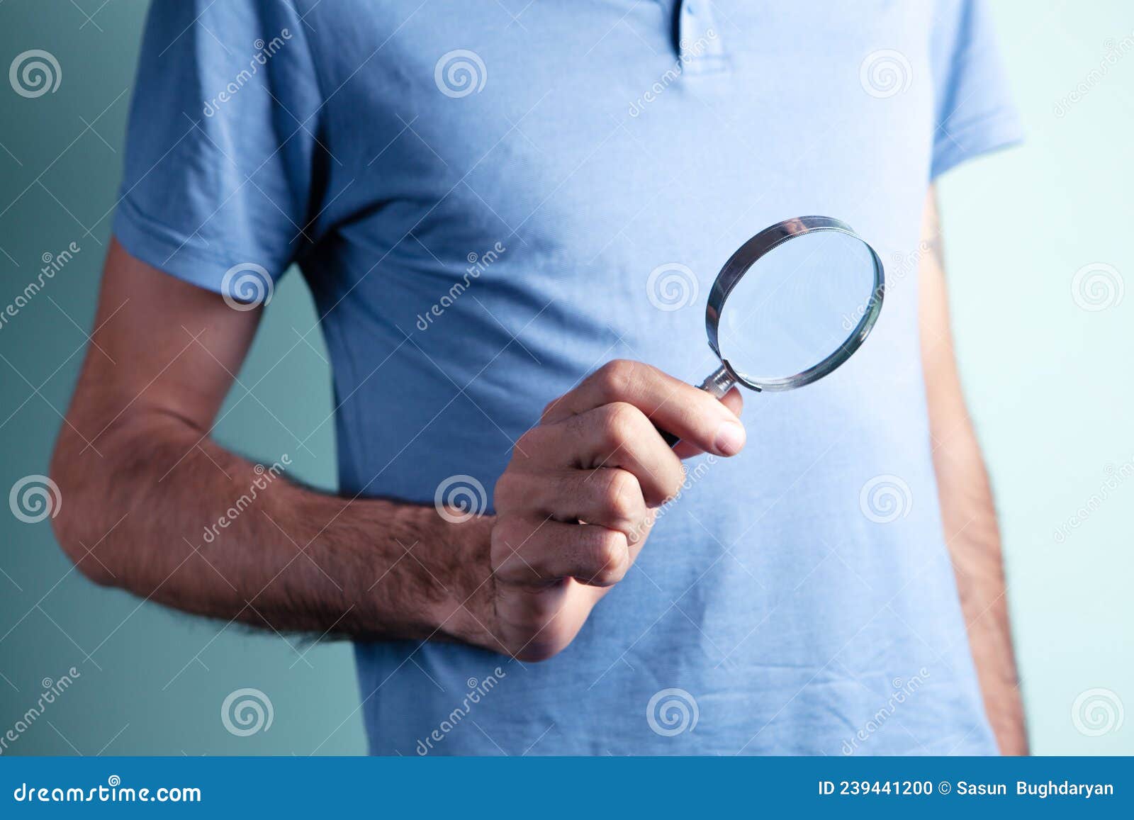 A Man Holding a Magnifying Glass Stock Photo - Image of investigate ...