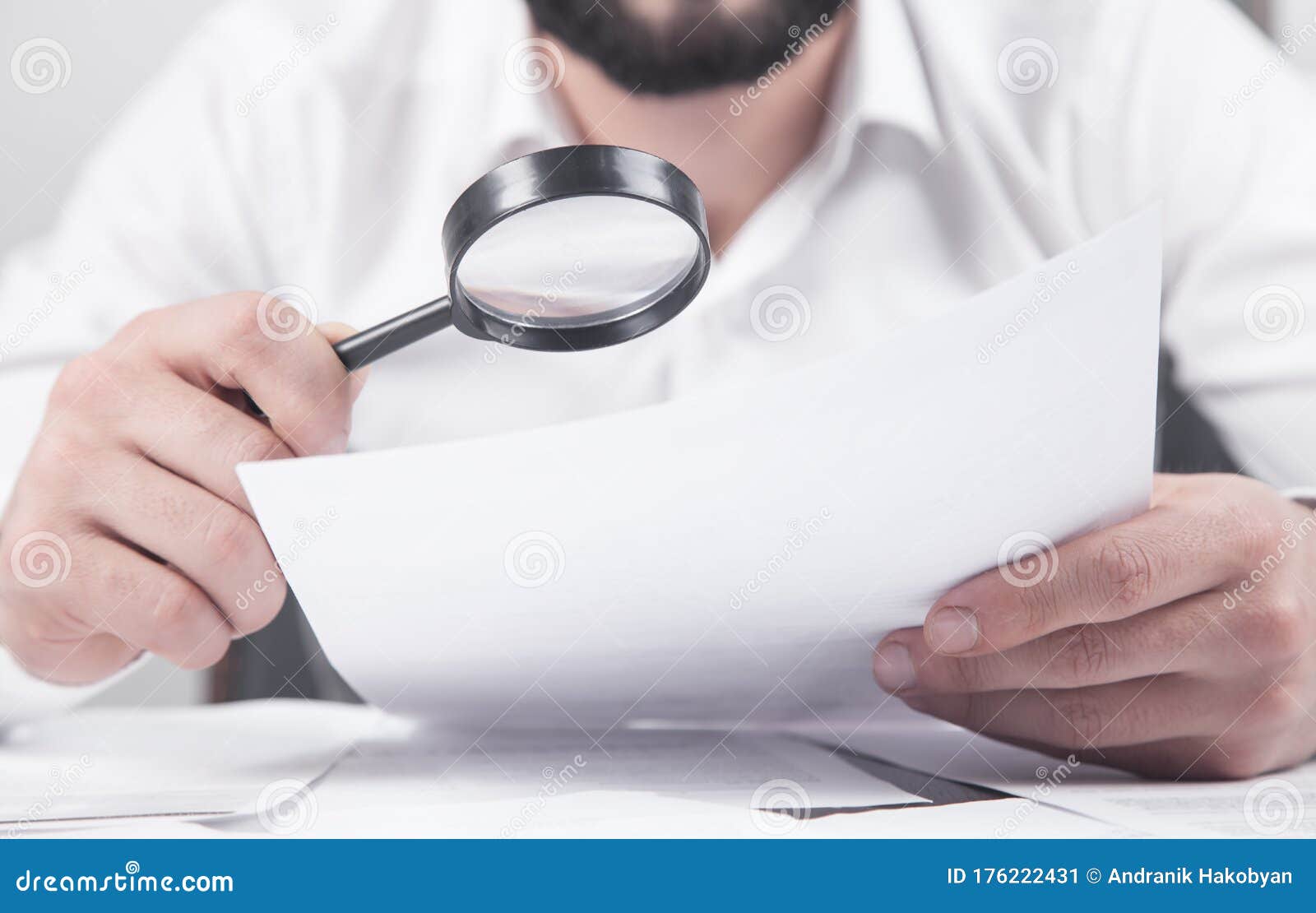 Man Holding Magnifying Glass with Documents Stock Image - Image of ...