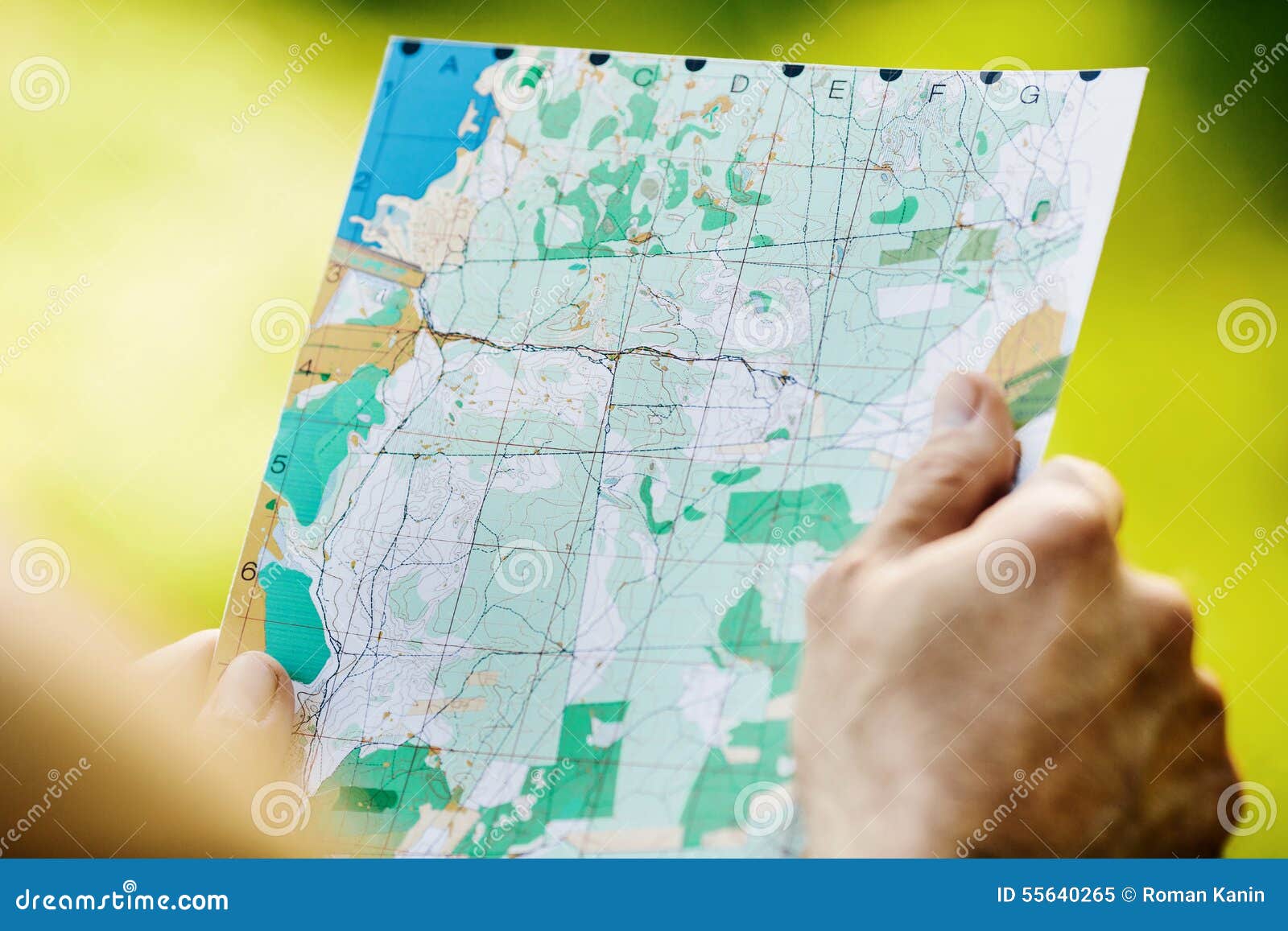 Man Holding a Map in His Hand. Stock Image - Image of exploration ...