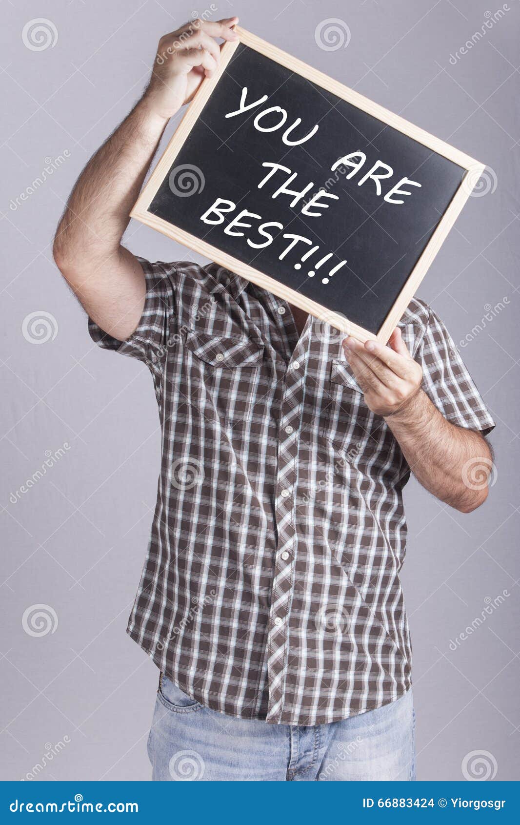 Man Holding Message Written on a Blackboard Stock Photo - Image of ...
