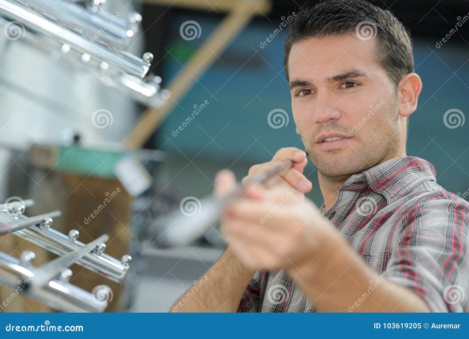Man holding metal bar stock image. Image of horizontal - 103619205