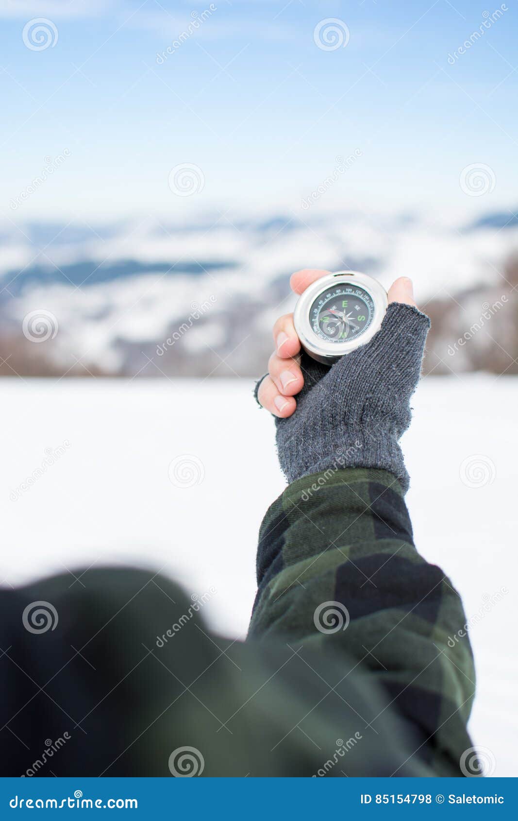 Man Holding a Metal Compass on Mountain Stock Photo - Image of east ...