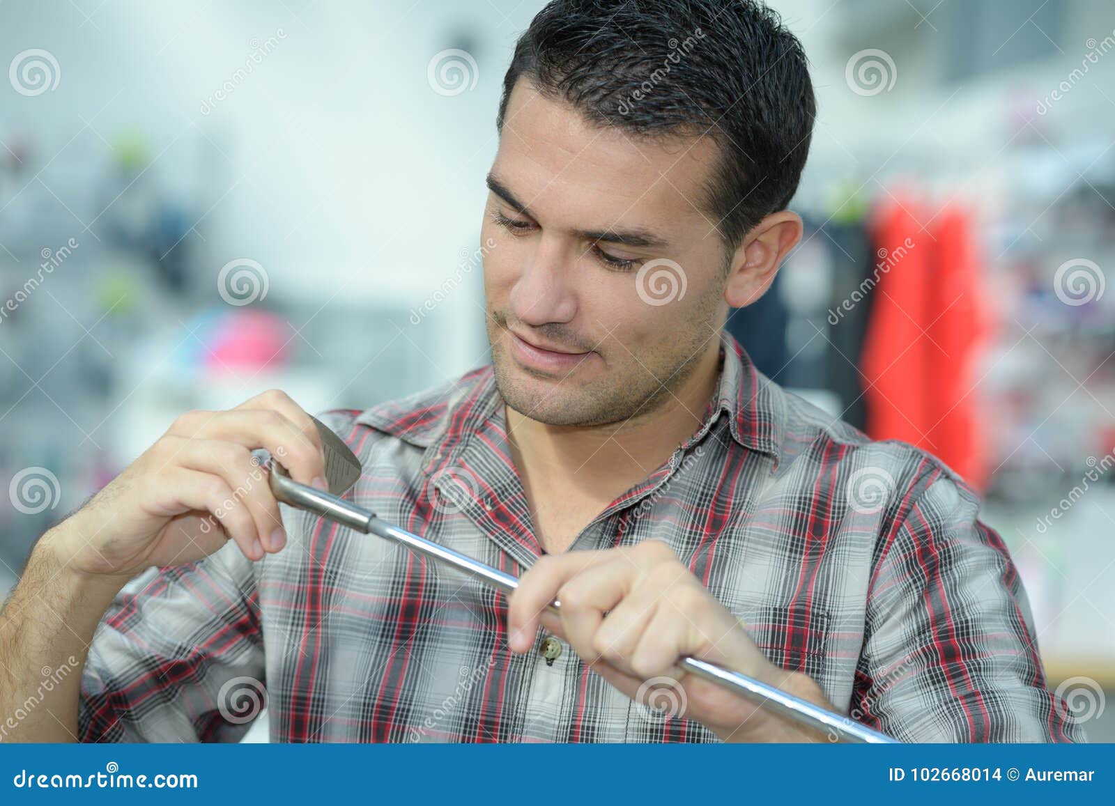 Man holding metal stick stock photo. Image of manufacturing - 102668014