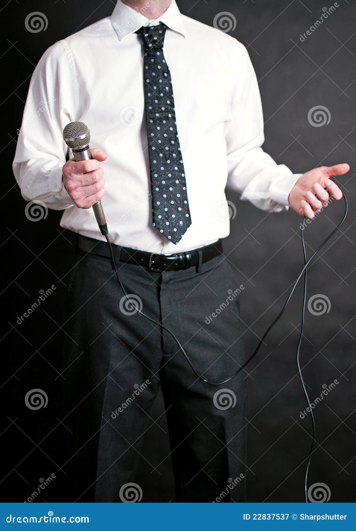Man holding a microphone stock image. Image of speaker - 22837537
