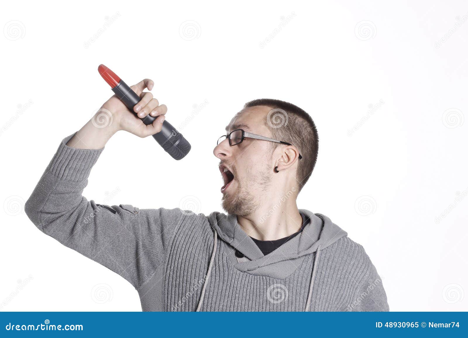 Man Holding a Microphone and Singing Stock Image - Image of person ...