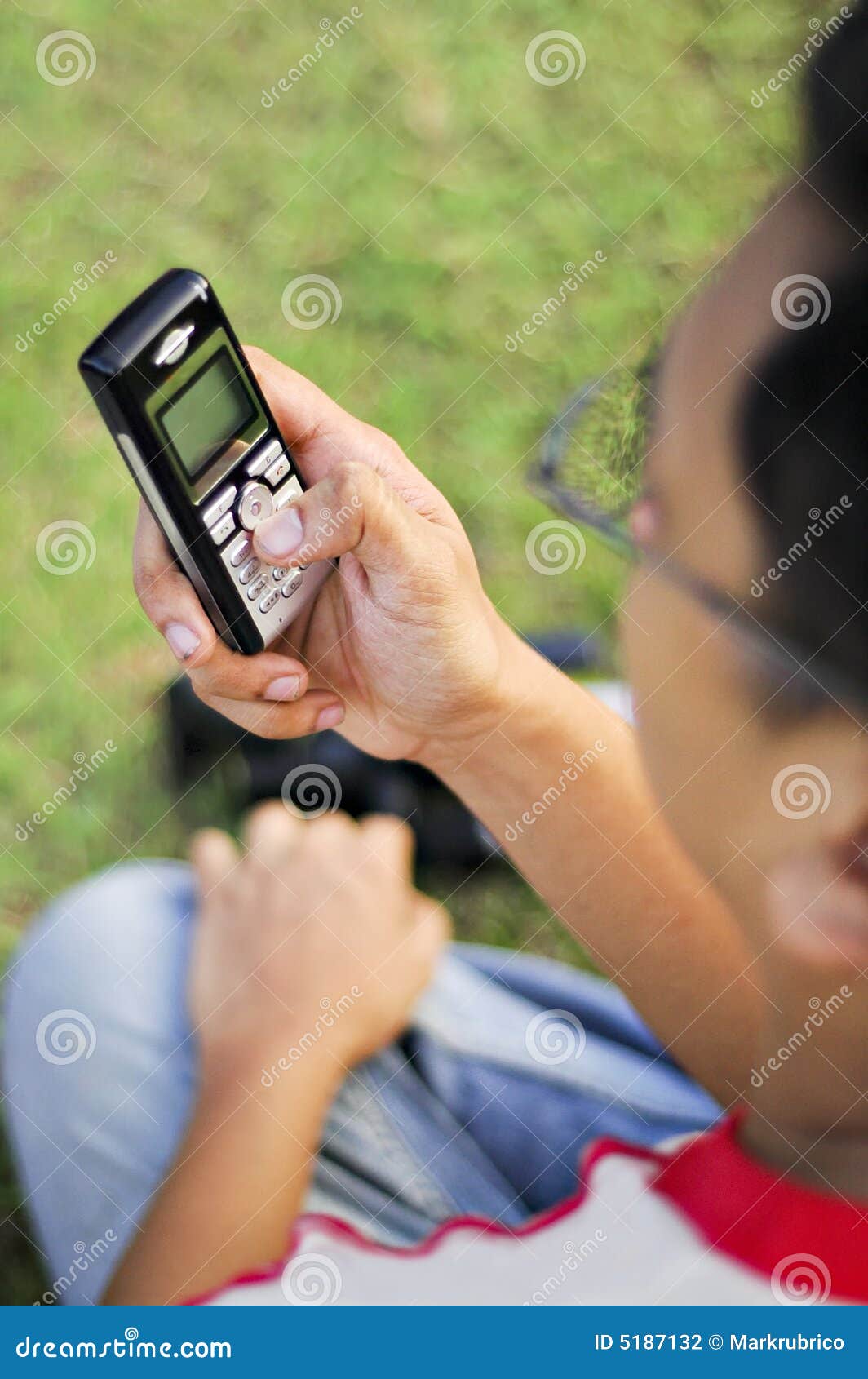 Man Holding Mobile Phone stock photo. Image of street - 5187132