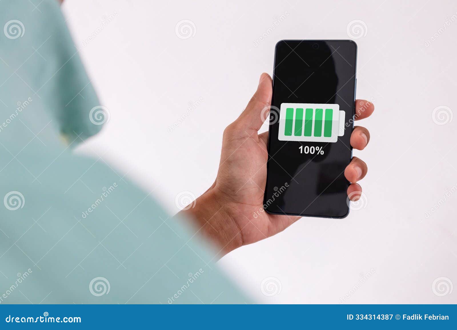 Man Holding a Mobile Phone with Full Battery 100 Percent Symbol on ...