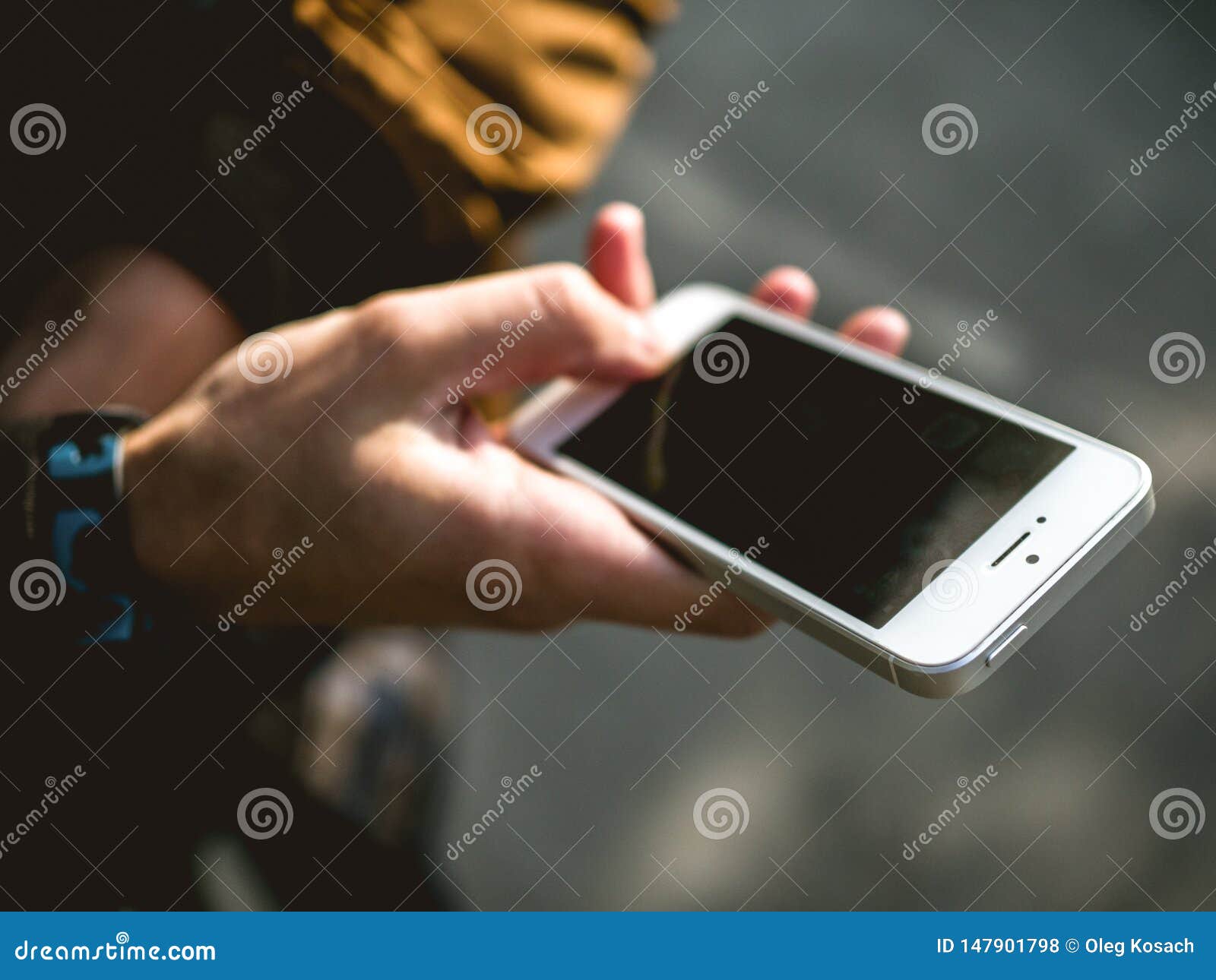 Man Holding Mobile Phone in Their Hand Stock Photo - Image of ...