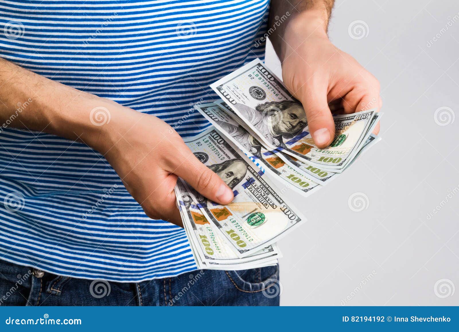 Man holding money in hand stock photo. Image of banking - 82194192