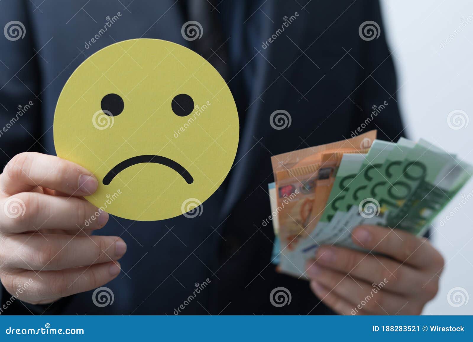 Man Holding Money and a Sad Smiley Face Stock Image - Image of isolated ...