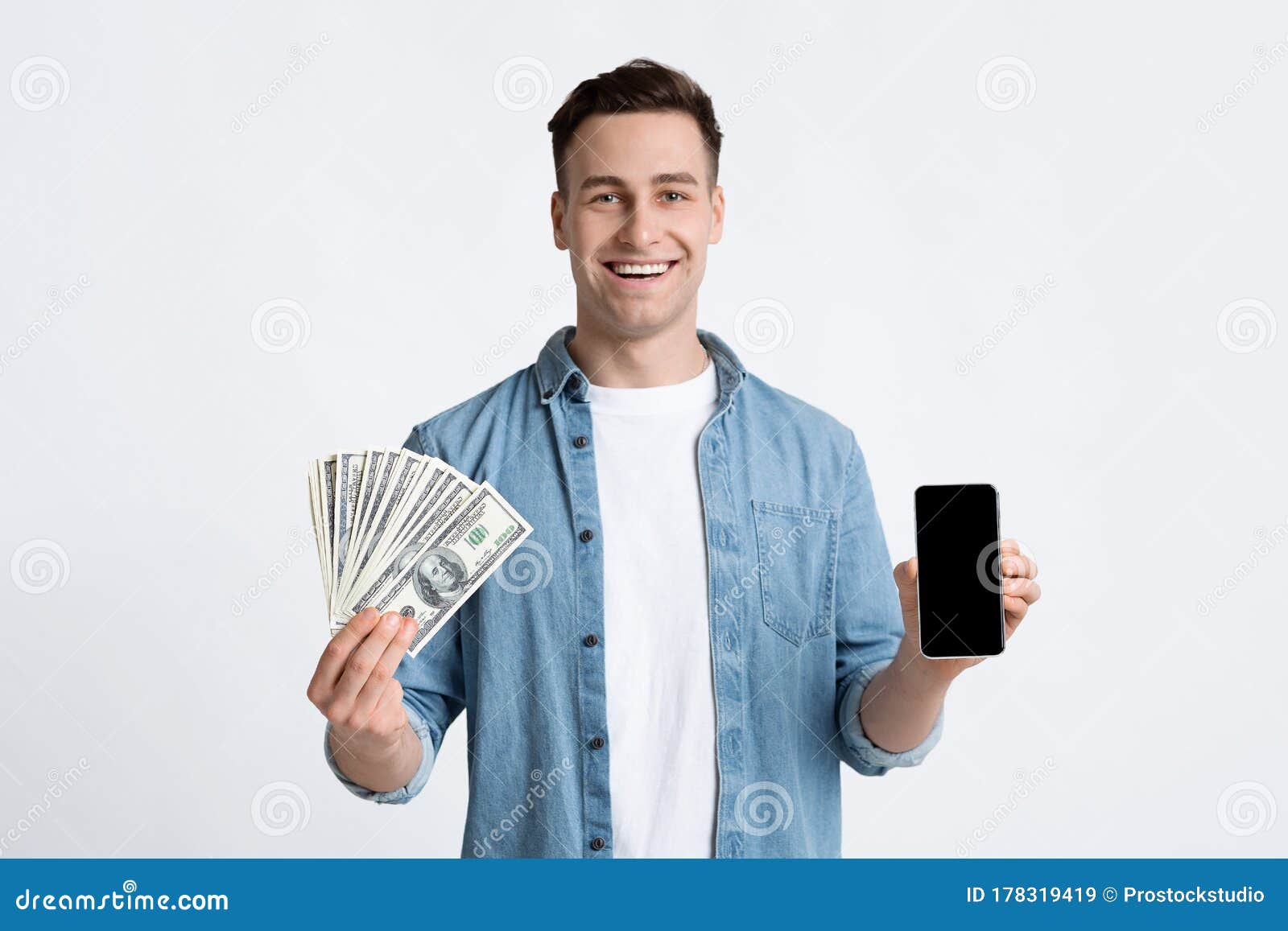 Man Holding Money and Smartphone in Hands Stock Image - Image of ...