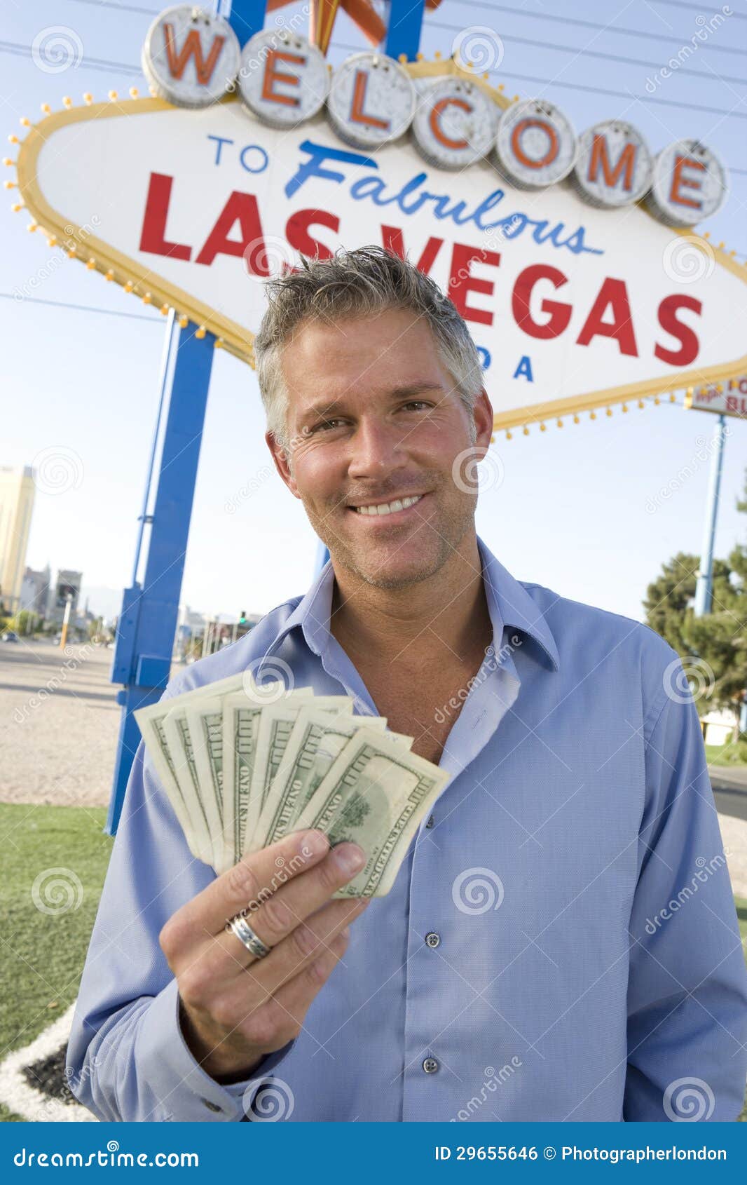 Man Holding Money Welcome Sign Background Stock Photos - Free & Royalty ...