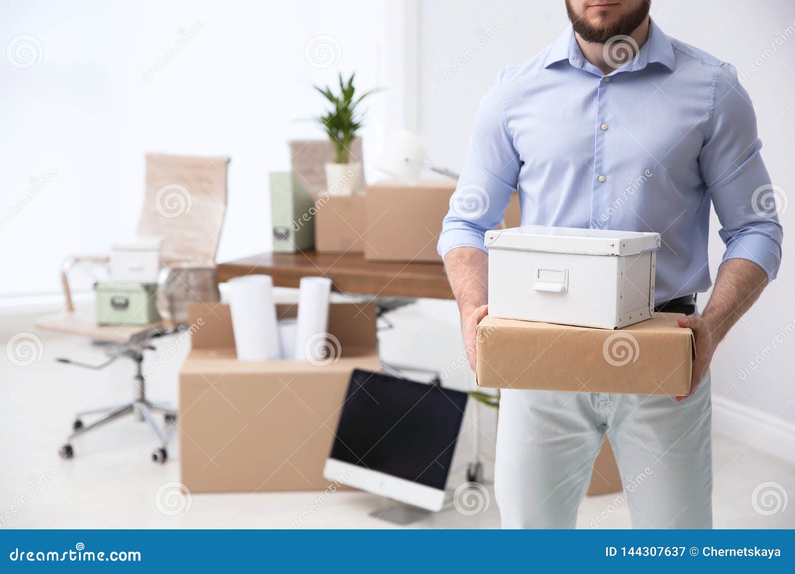 Man Holding Moving Boxes in New Office. Space for Text Stock Image ...