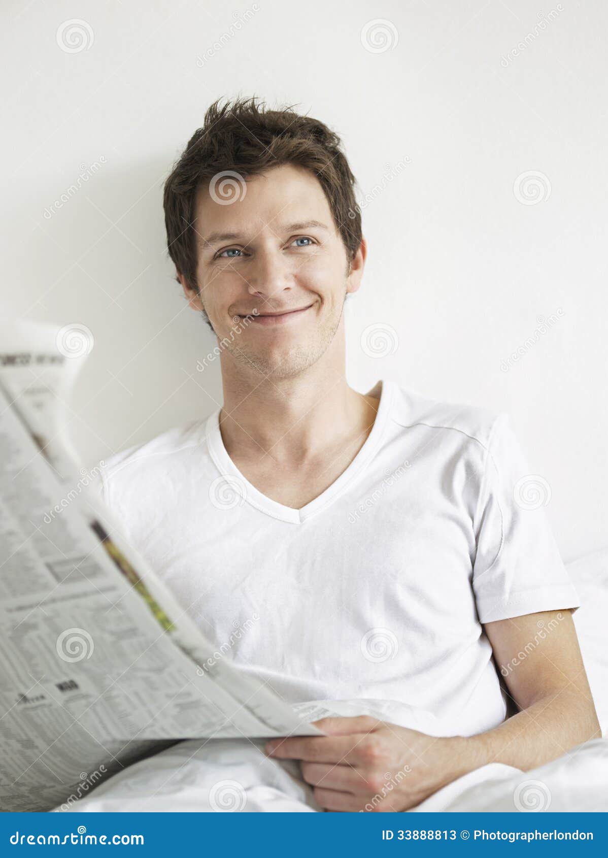 Man Holding Newspaper in Bed Stock Image - Image of newspaper, home ...