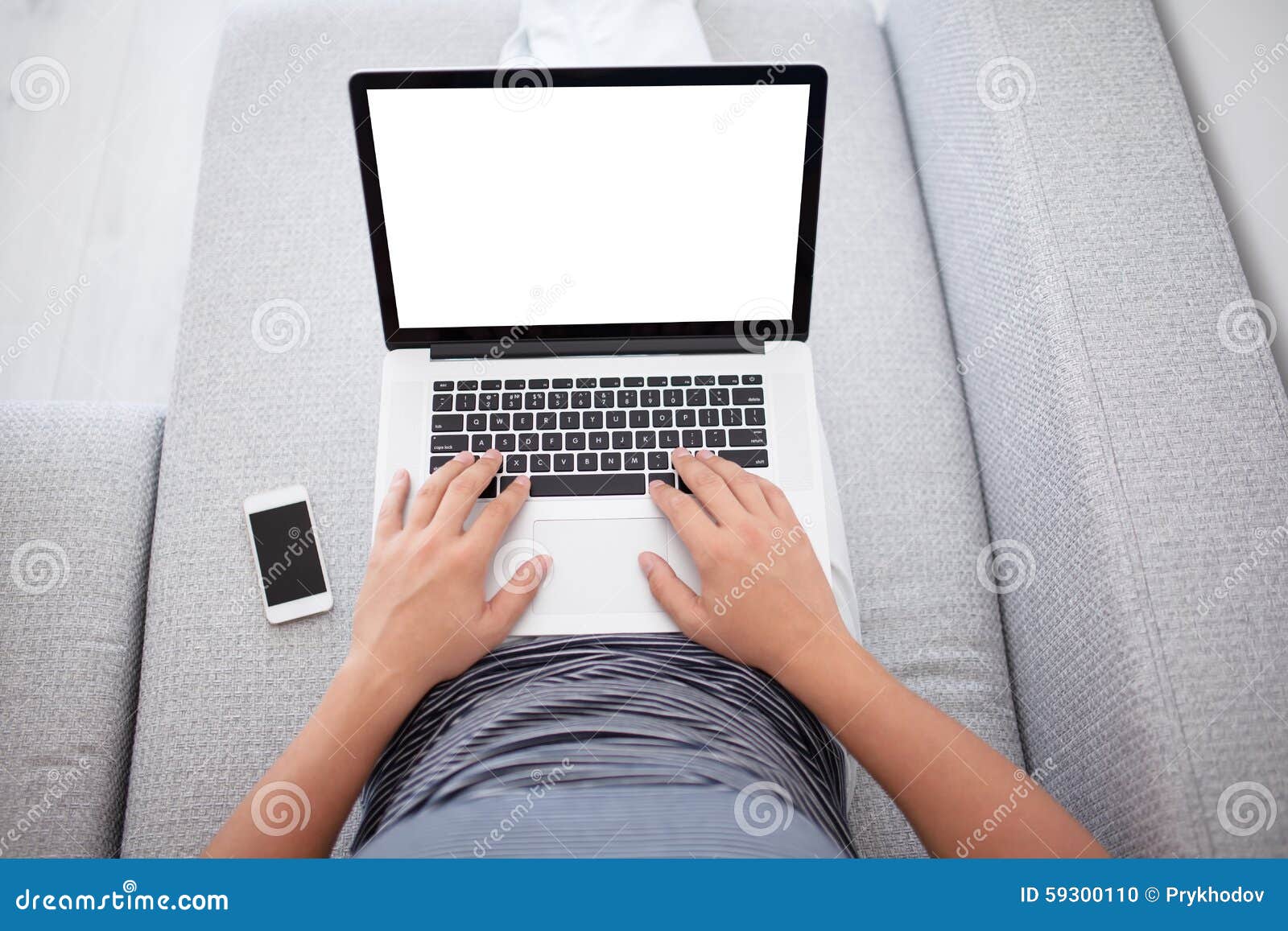 Man Holding Notebook with Screen and Phone on Sofa Stock Photo - Image ...