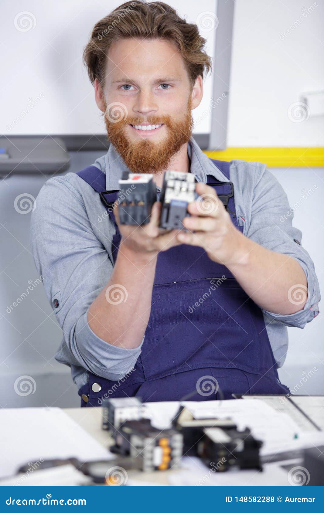 Man Holding Object in Factory Stock Photo - Image of computer ...